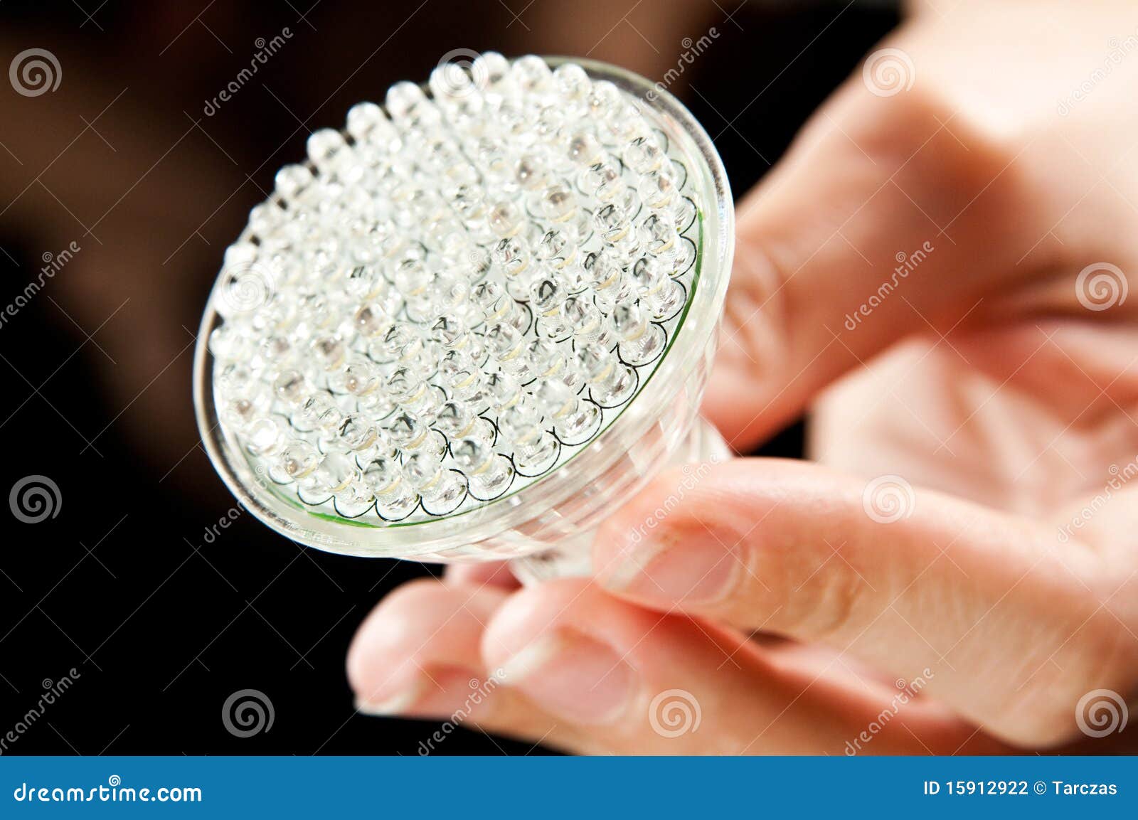 Led light bulb in hand stock photo. Image of electrical - 15912922