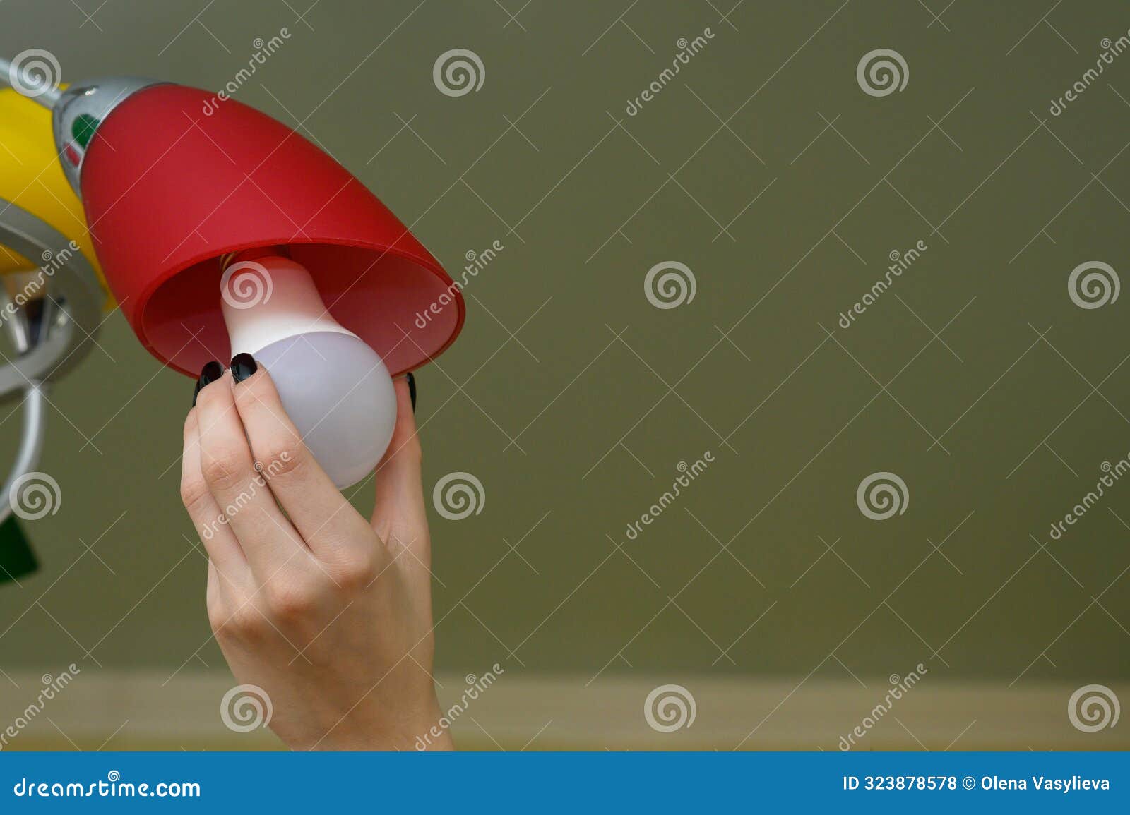 LED light bulb in hand stock photo. Image of saving - 323878578