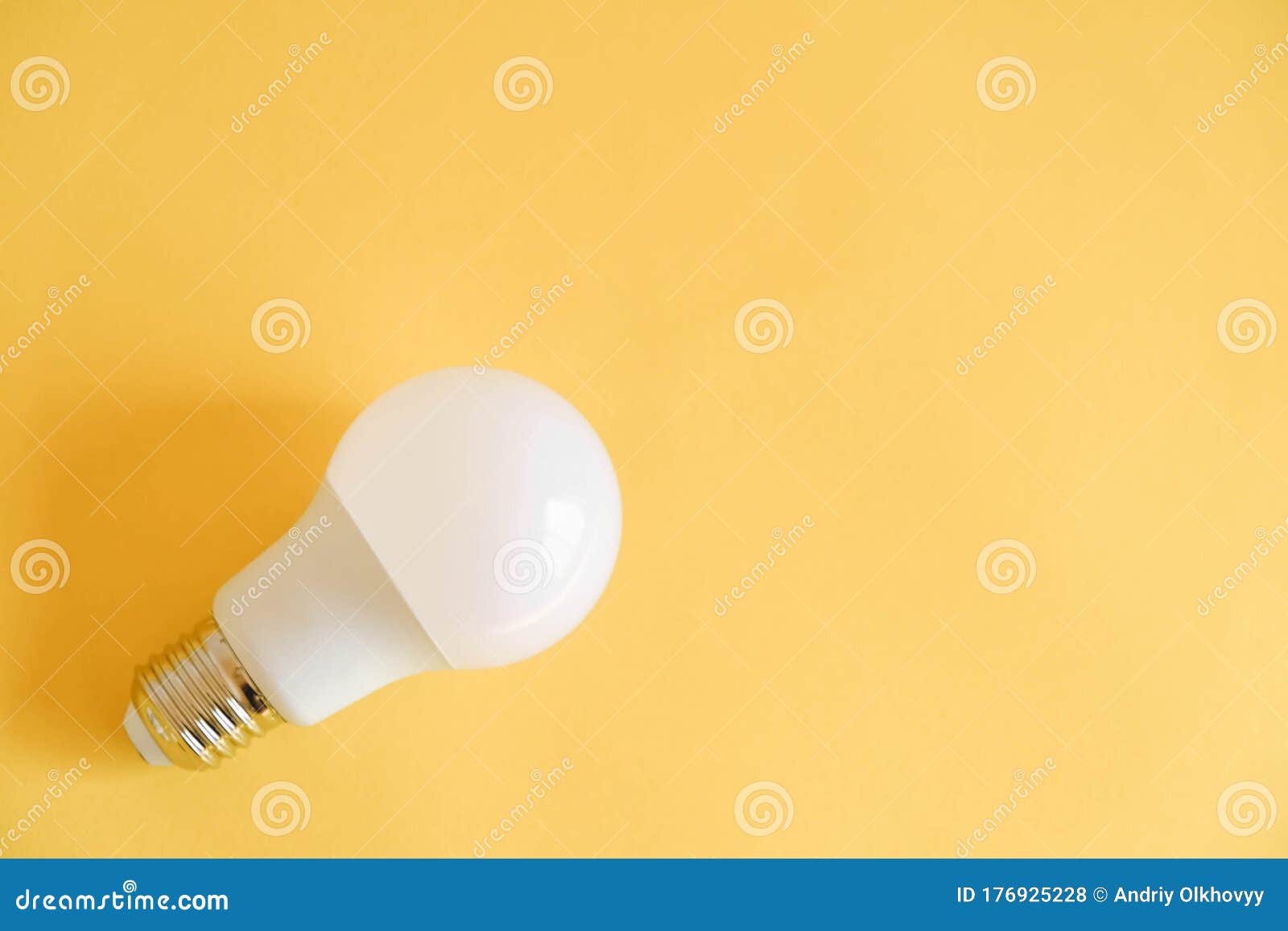 LED Light Bulb on Yellow Background. Top View Stock Photo - Image of ...