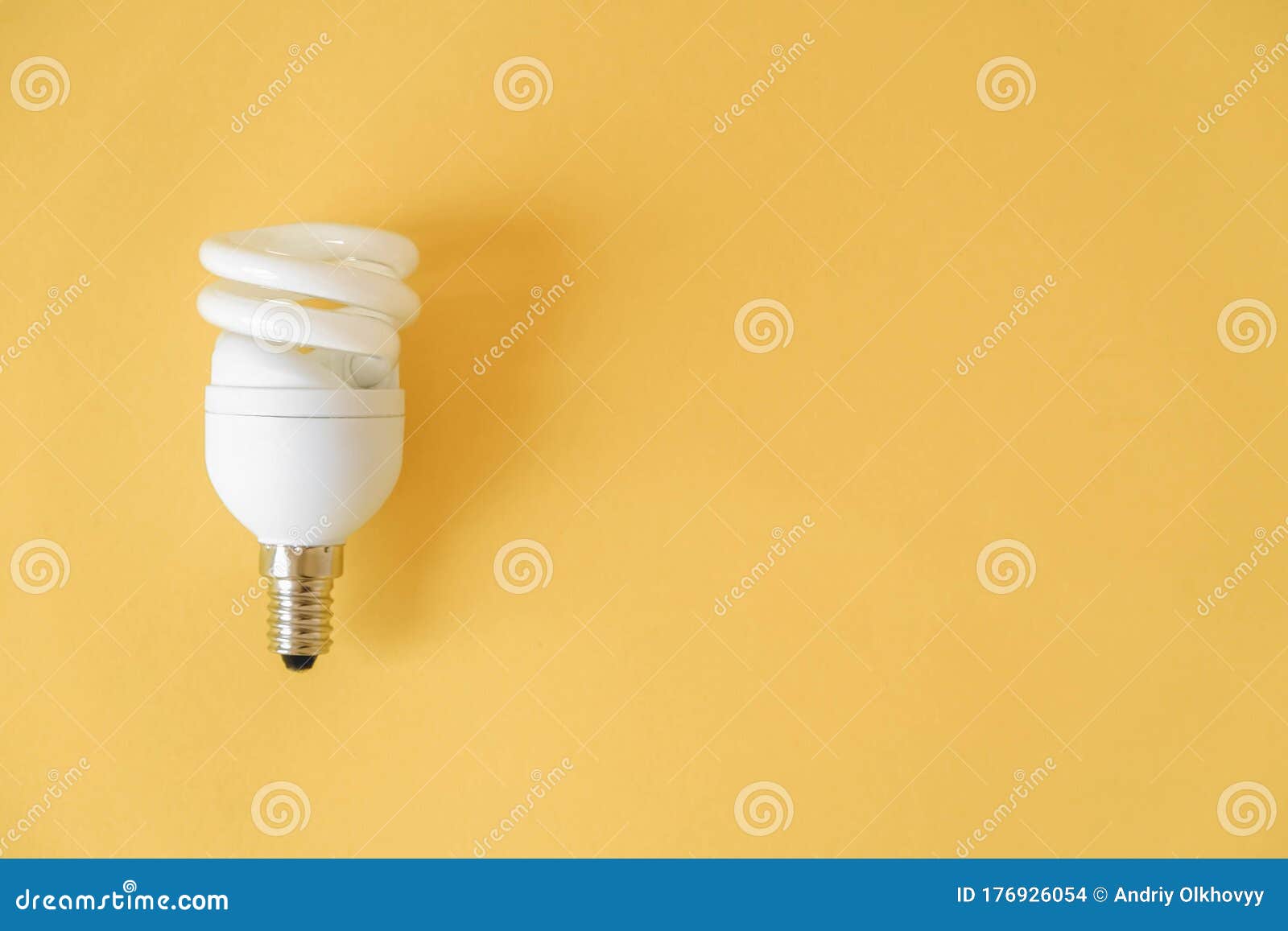 LED Light Bulb on Yellow Background. Top View Stock Photo - Image of ...