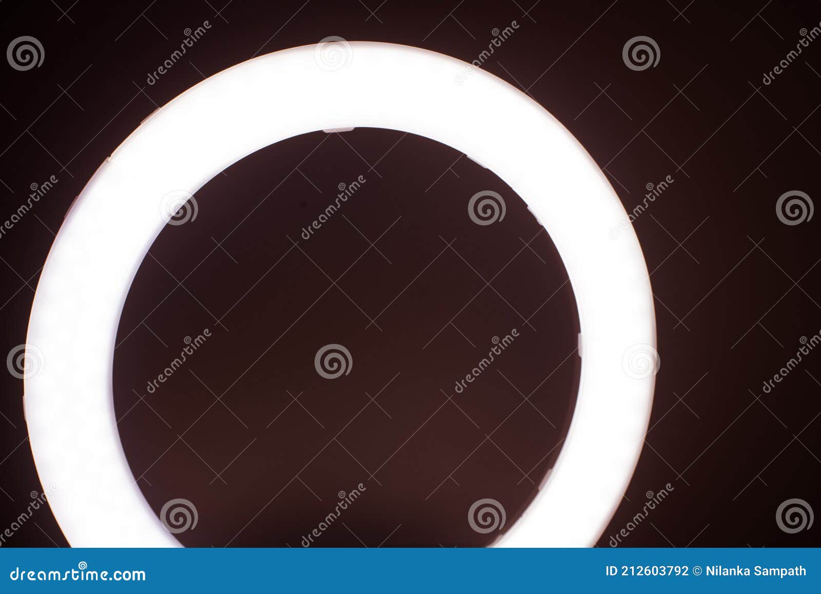 LED Ring Light in a Studio Room Against Empty Walls Front View Stock ...