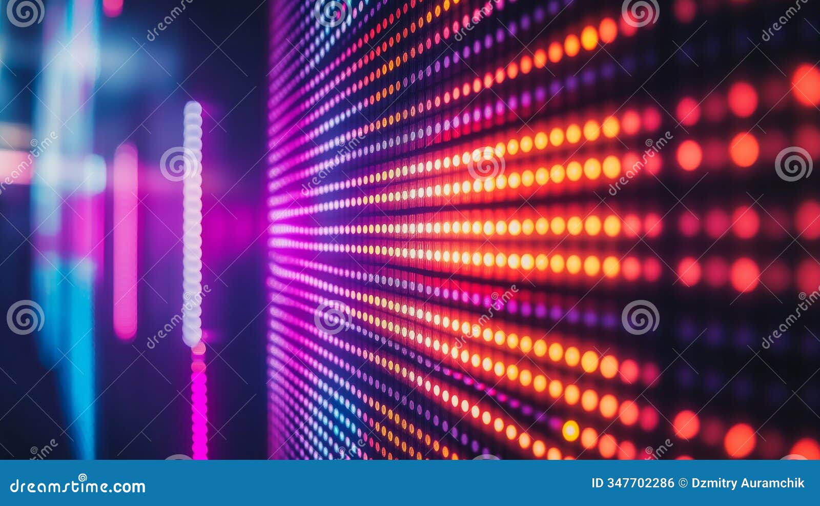 The LED Wall Showcases a Dot Pattern in Green, Blue, and Red on a Black ...