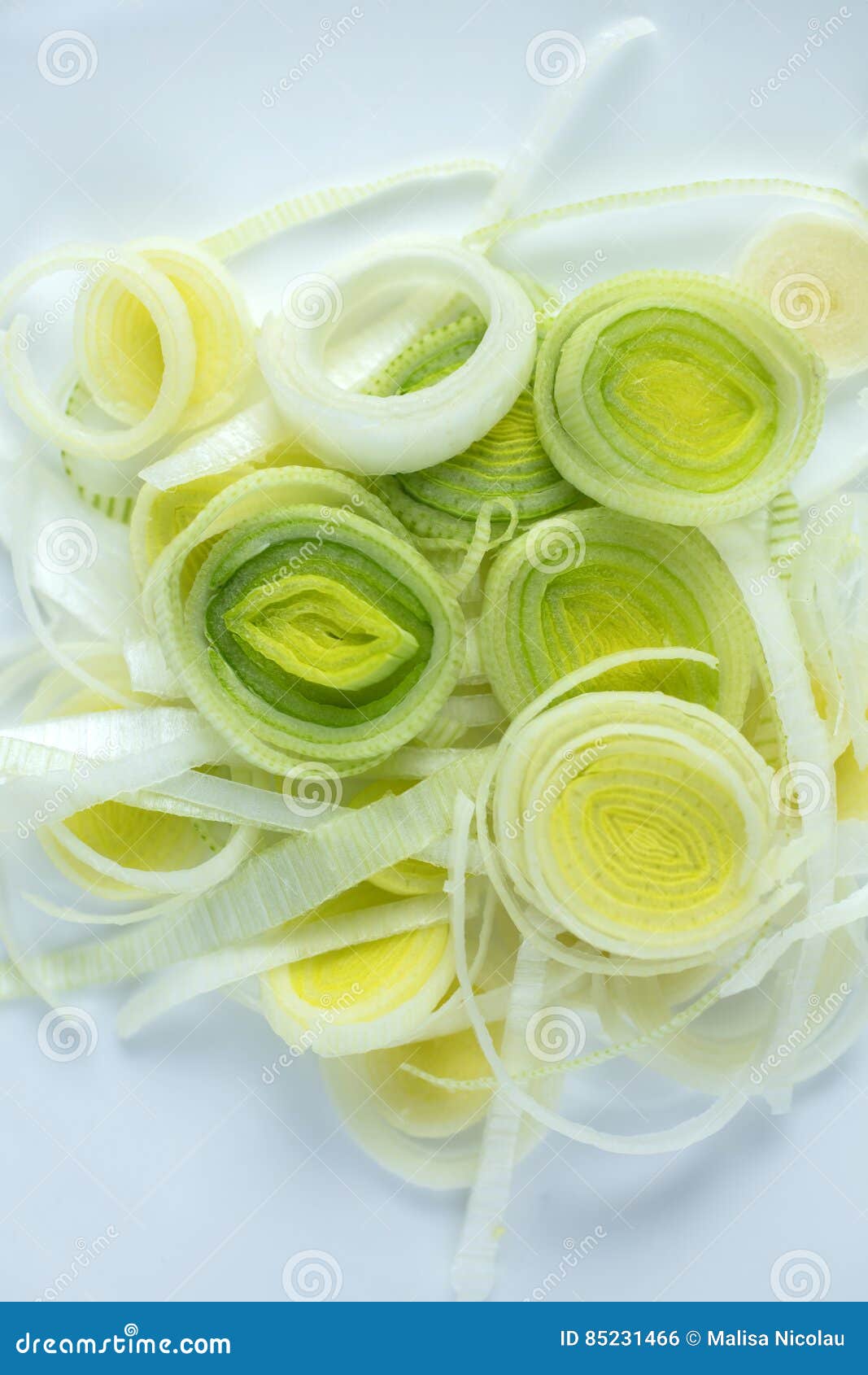 Leeks sliced in thin rings stock photo. Image of onions - 85231466