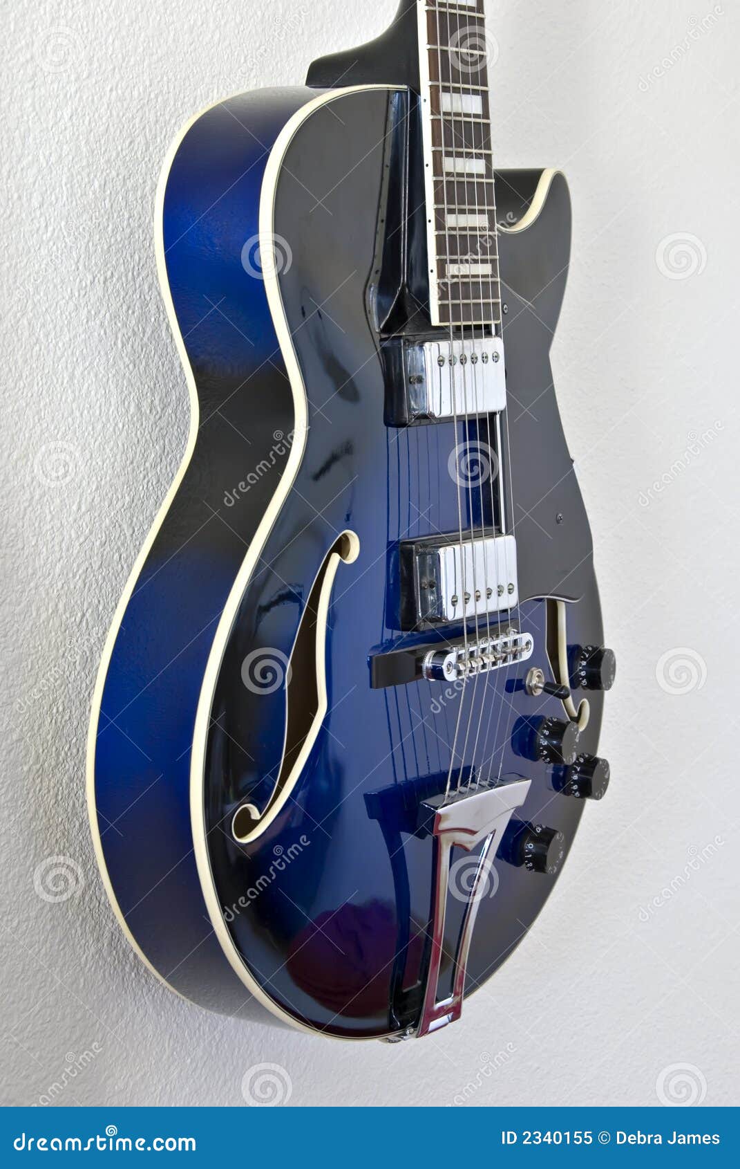 Left of blue jazz guitar stock image. Image of detail - 2340155