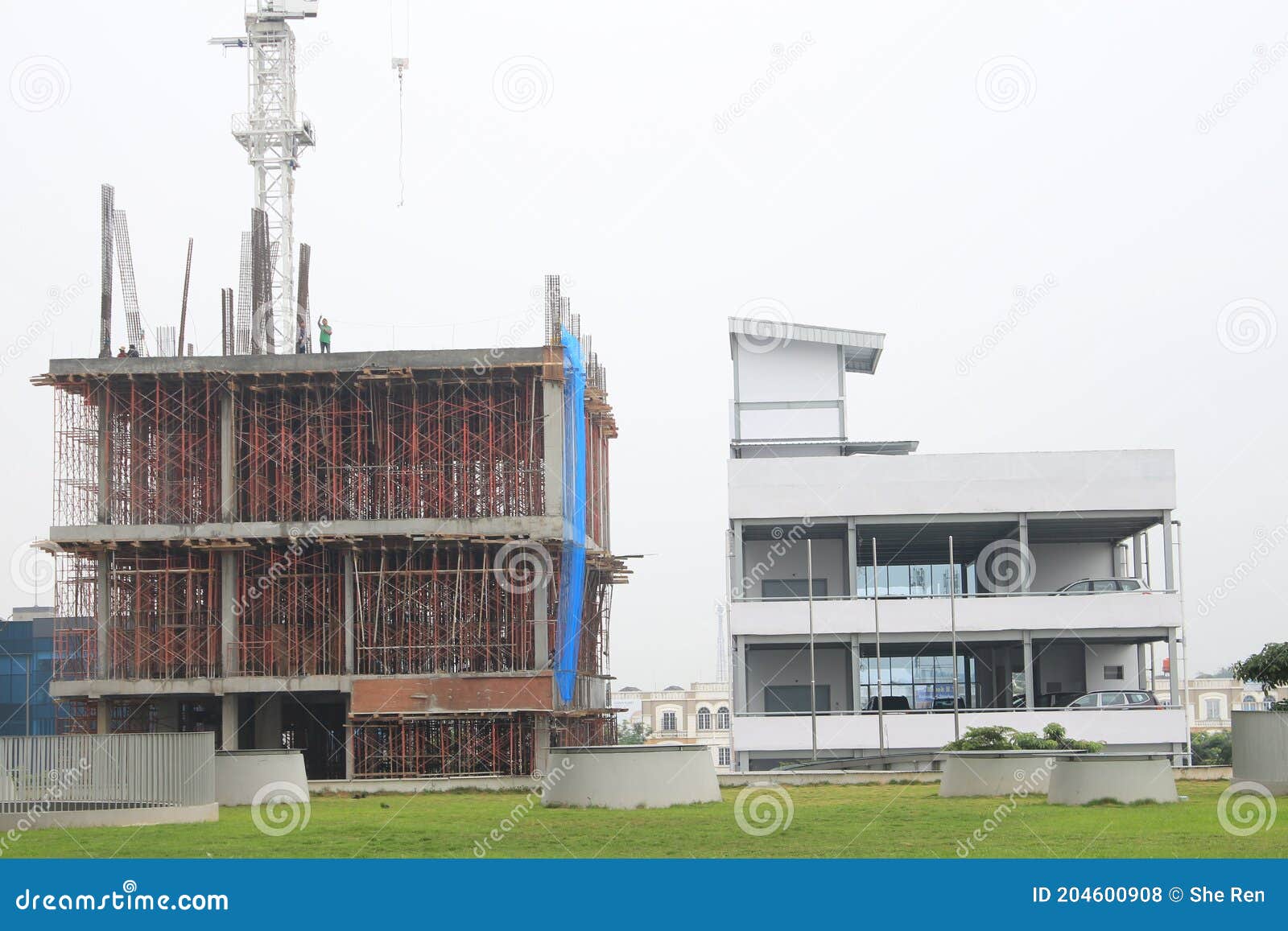 The Left Building is Under Construction and the Other Building is ...