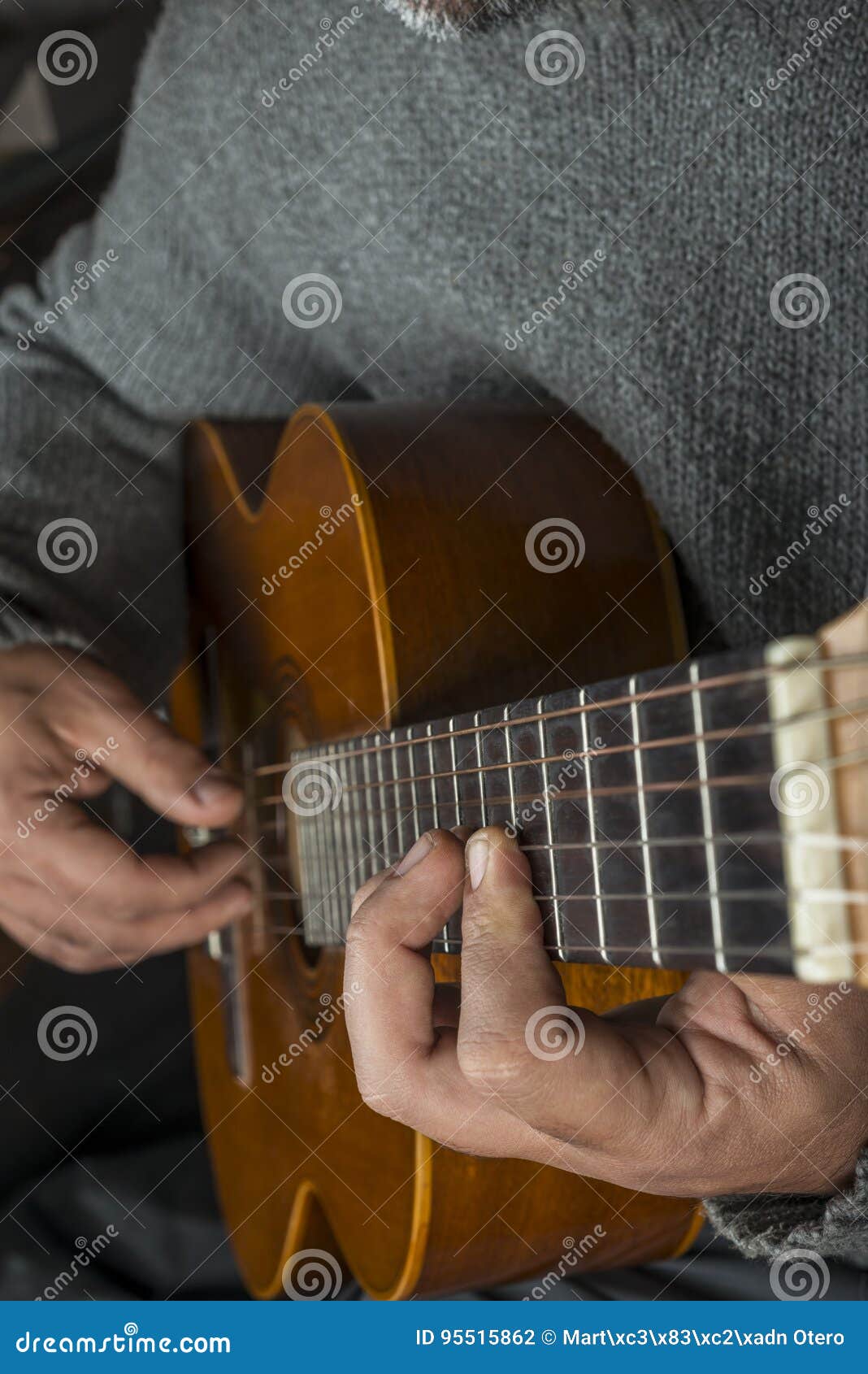 Left hand on the guitar stock photo. Image of closeup - 95515862