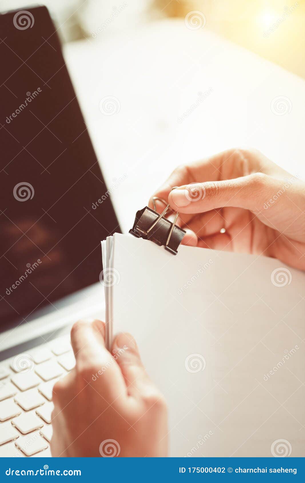 Left Hand Hold Document and Right Hand Use Metal Binder. Object and ...