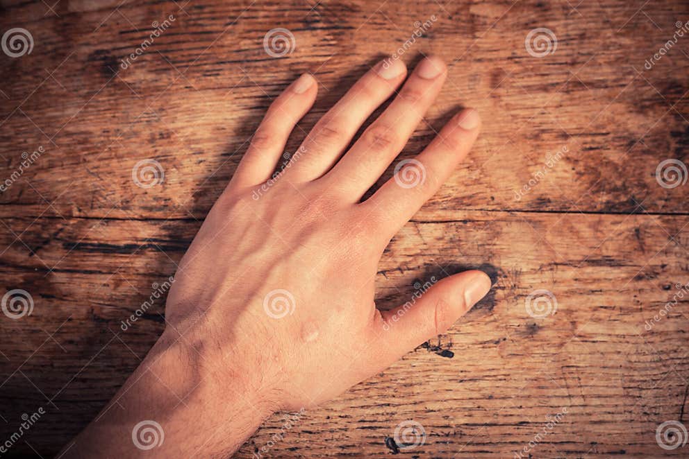 Left hand on a table stock photo. Image of adult, resting - 38560476