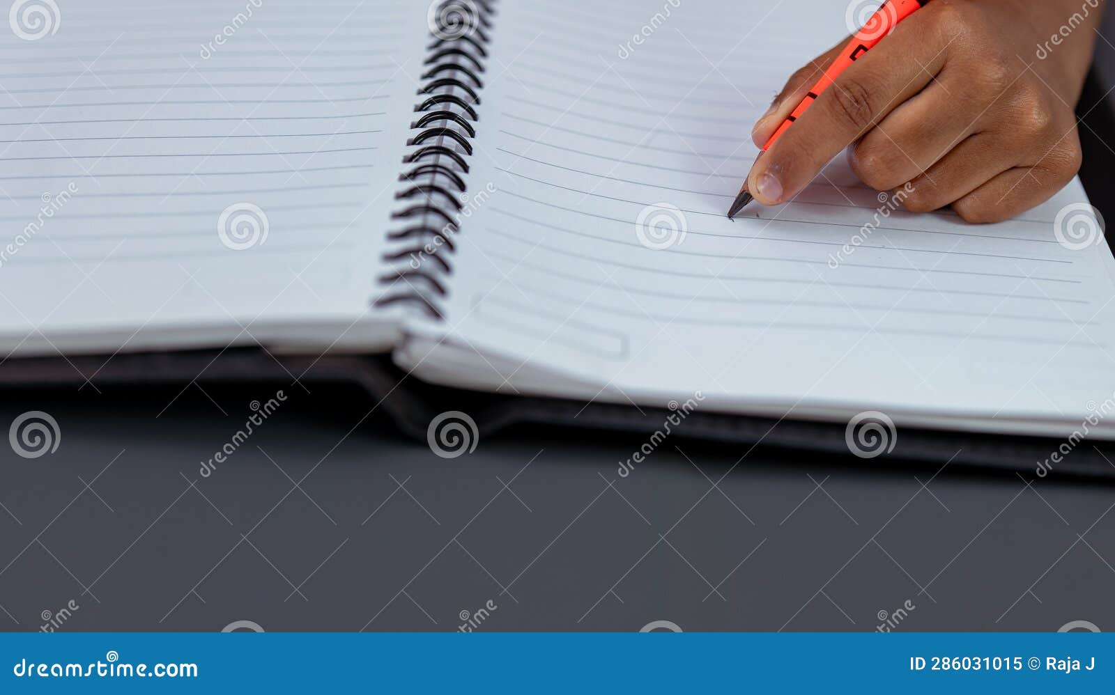 Left-handed Kid Writing in Note Stock Image - Image of lefthanded, hand ...