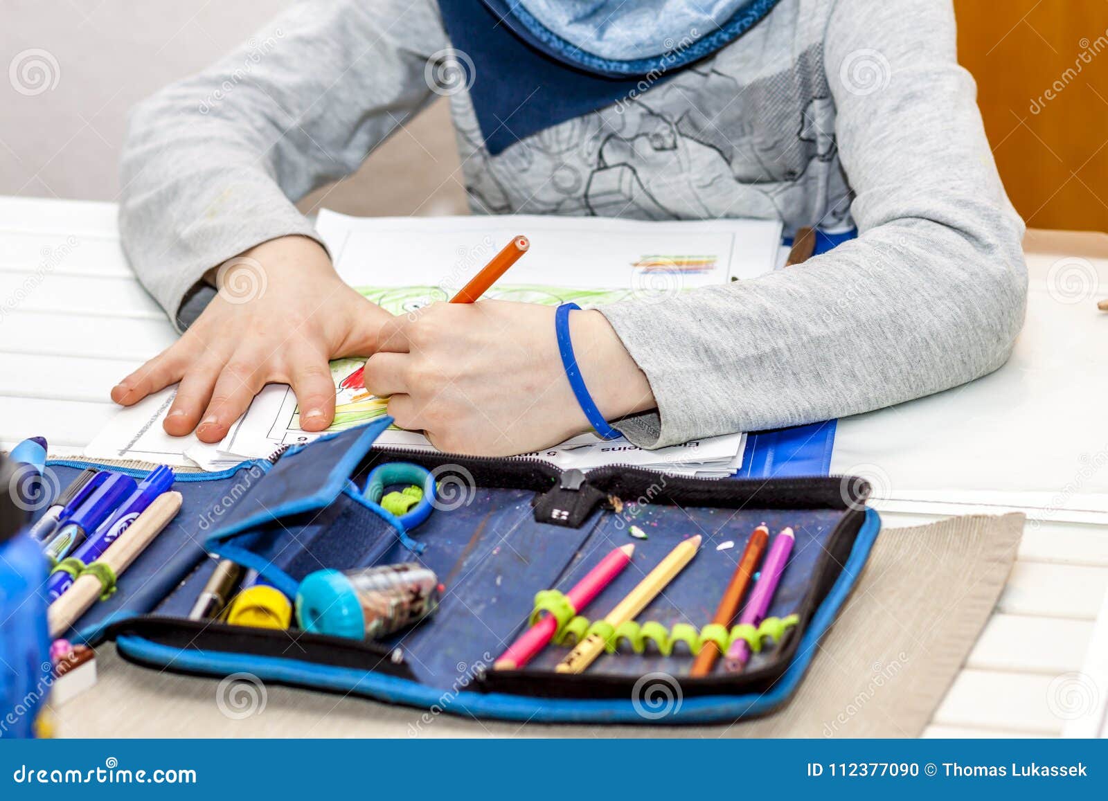 Left Handed Young Boy Working on His Homework Stock Photo - Image of ...