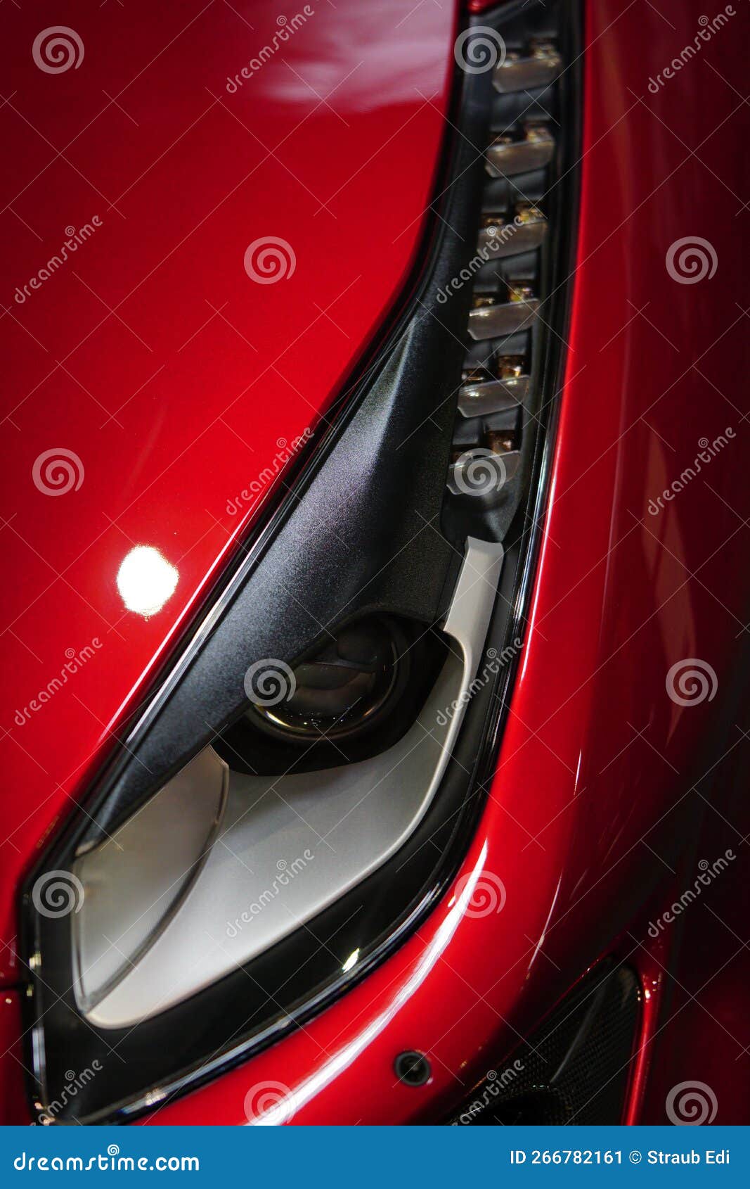 Left Headlight of a Red Sport Car Stock Image - Image of vehicle, sport ...