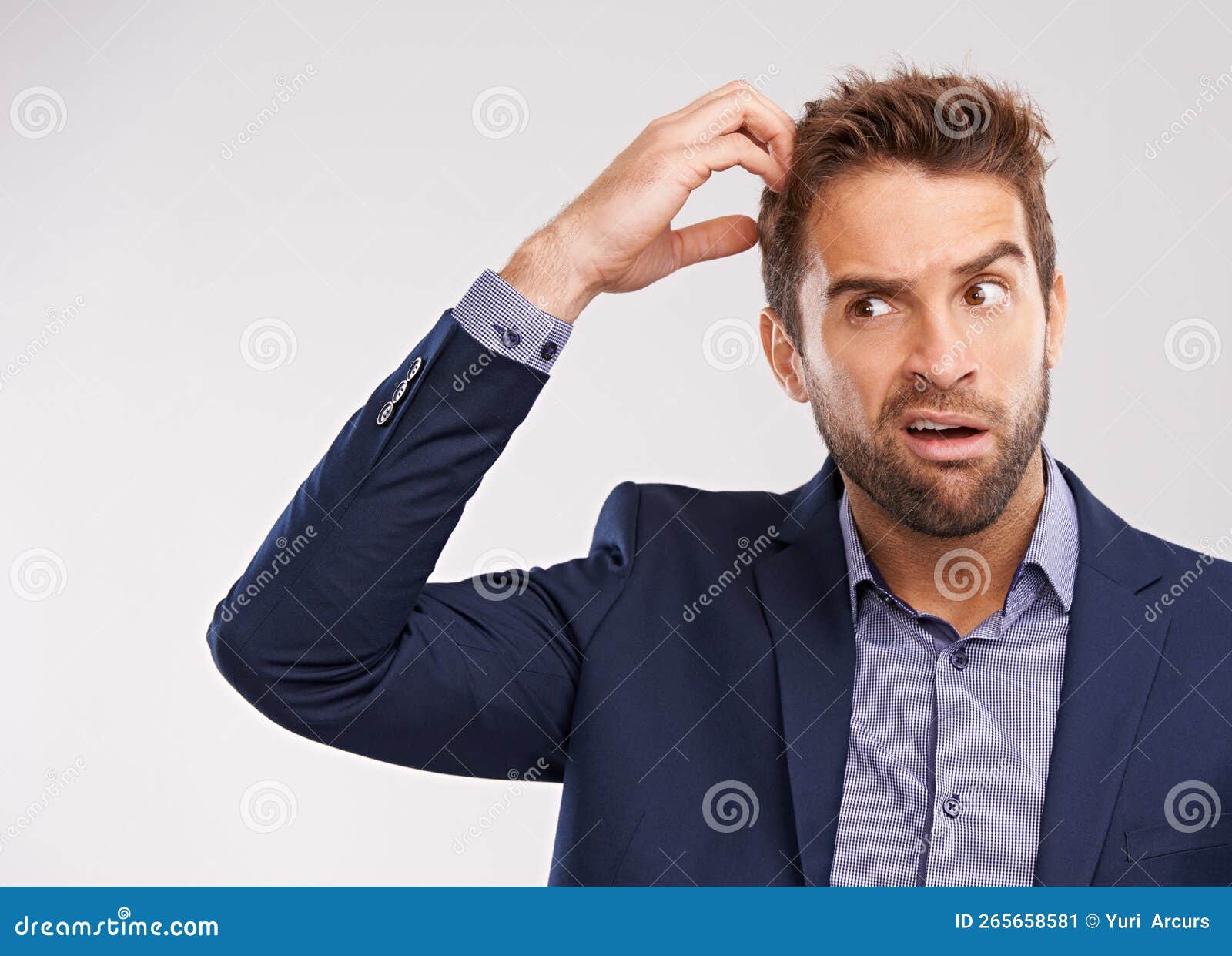 That Left Him Completely Baffled. Studio Shot of a Handsome Man with a ...