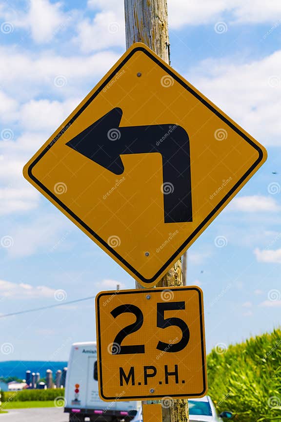 Left Turn ArrowSign 25 MPH stock photo. Image of sign - 74649730