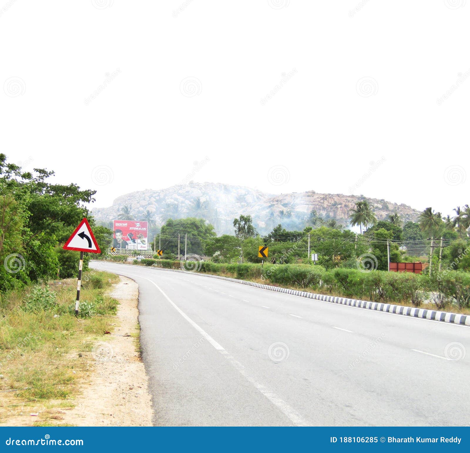 Left Turn Sign Board on a Highway at a Left Curve on Road Stock Image ...