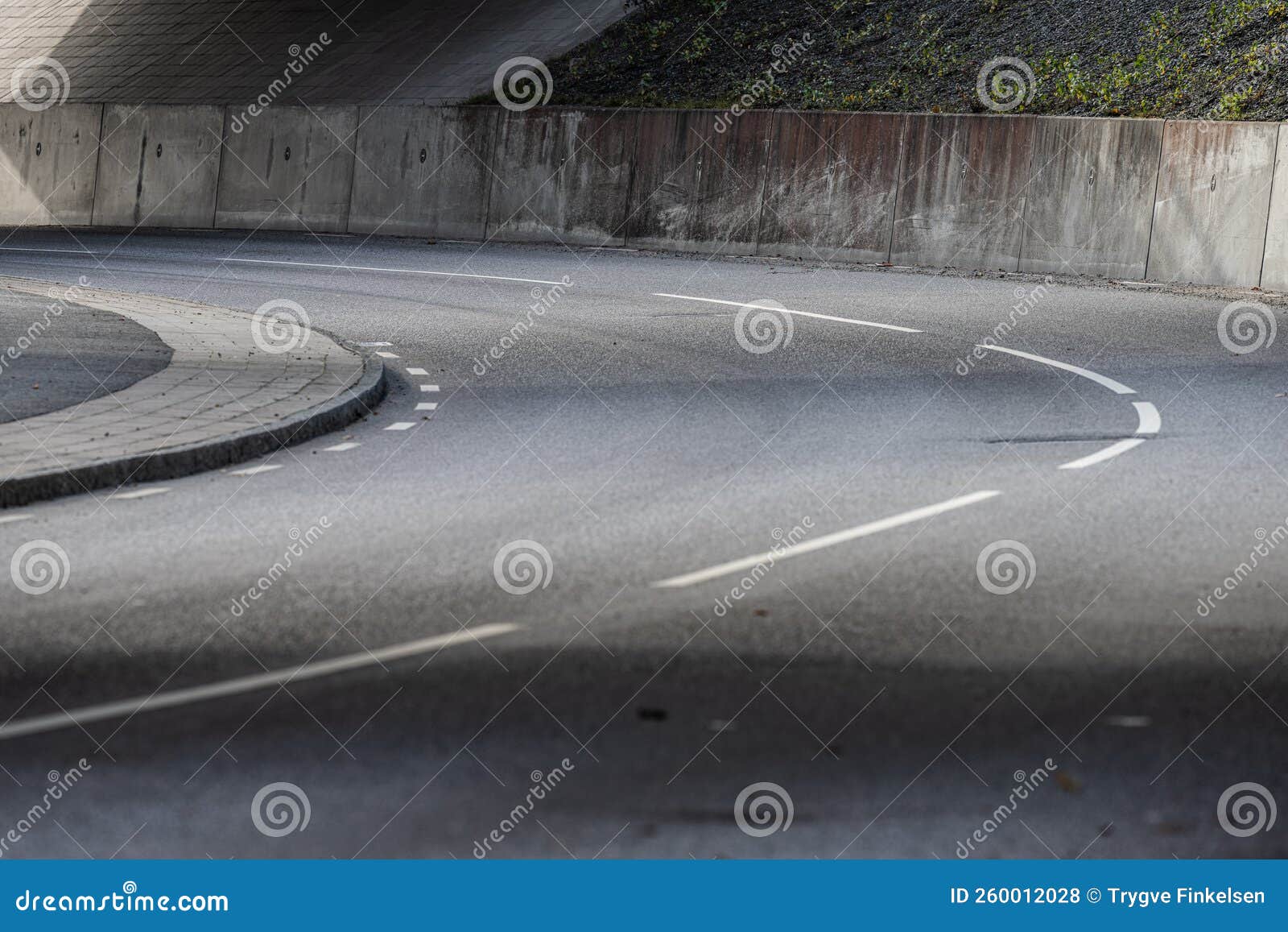 Left Turning Road Underneath Bridges.. Stock Photo - Image of path ...