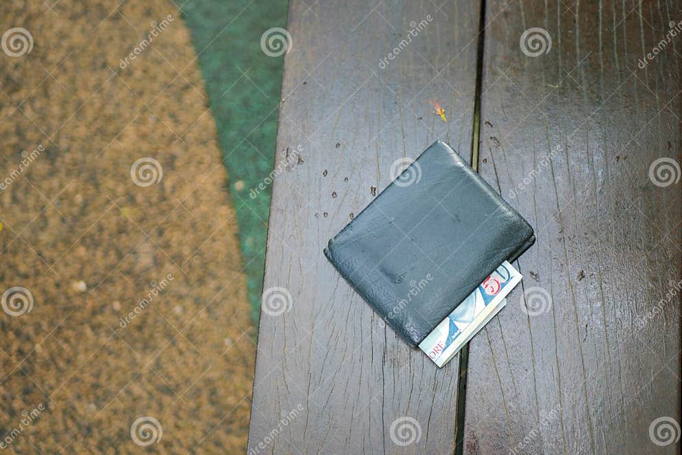 Left Wallet on a Bench in the Park Stock Photo - Image of banking ...