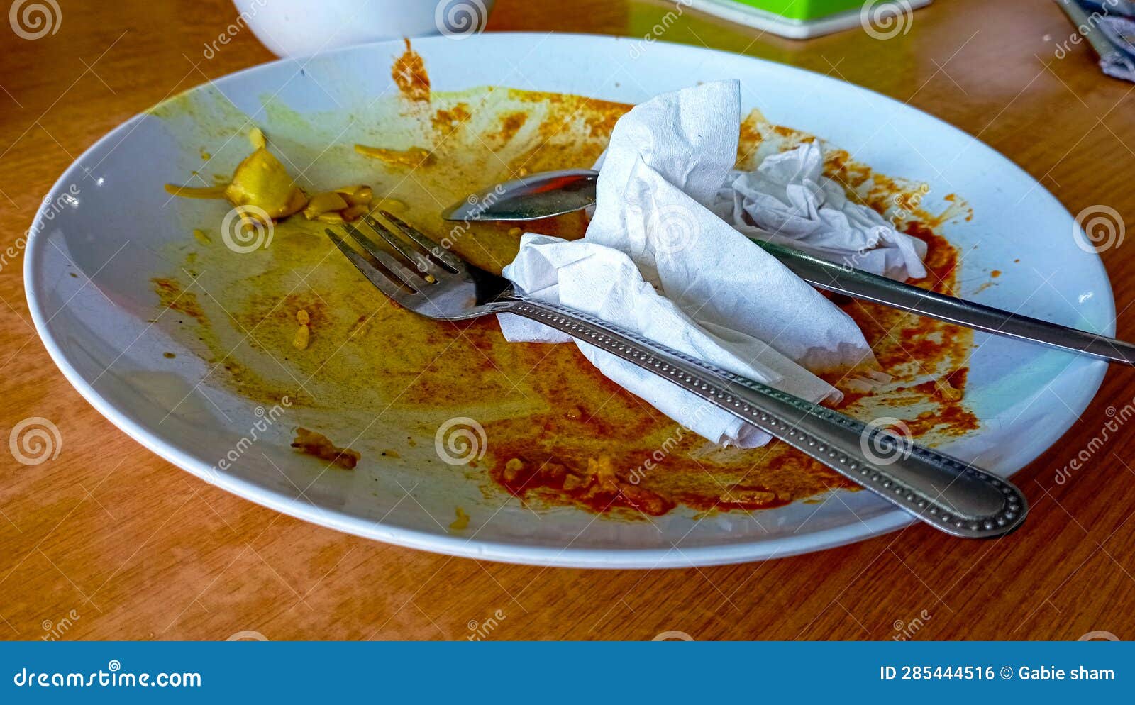 The Leftover Food and Tissue are on the Plate. Stock Photo - Image of ...