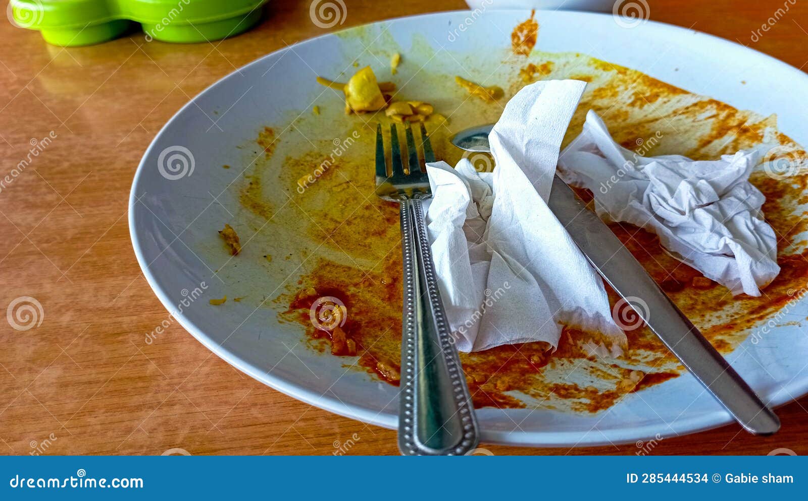 The Leftover Food and Tissue are on the Plate. Stock Photo - Image of ...