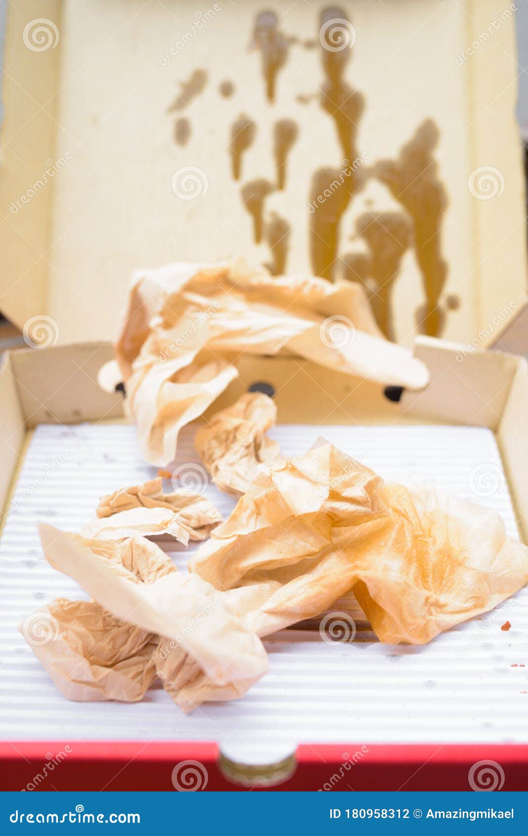 Close Up Shot of Leftover Pizza Box on Table with Tissue Papers Stock ...