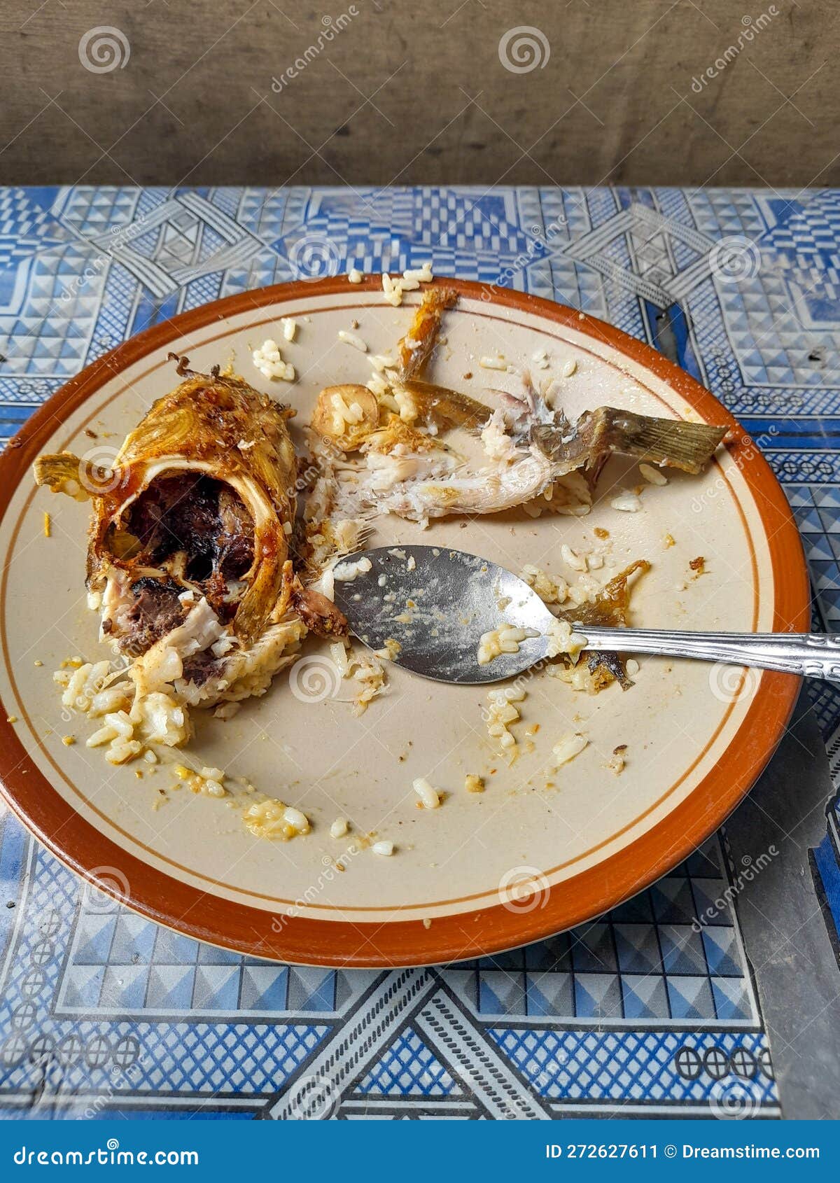 Leftovers Consisting of Fried Catfish Heads and Bones Stock Image ...