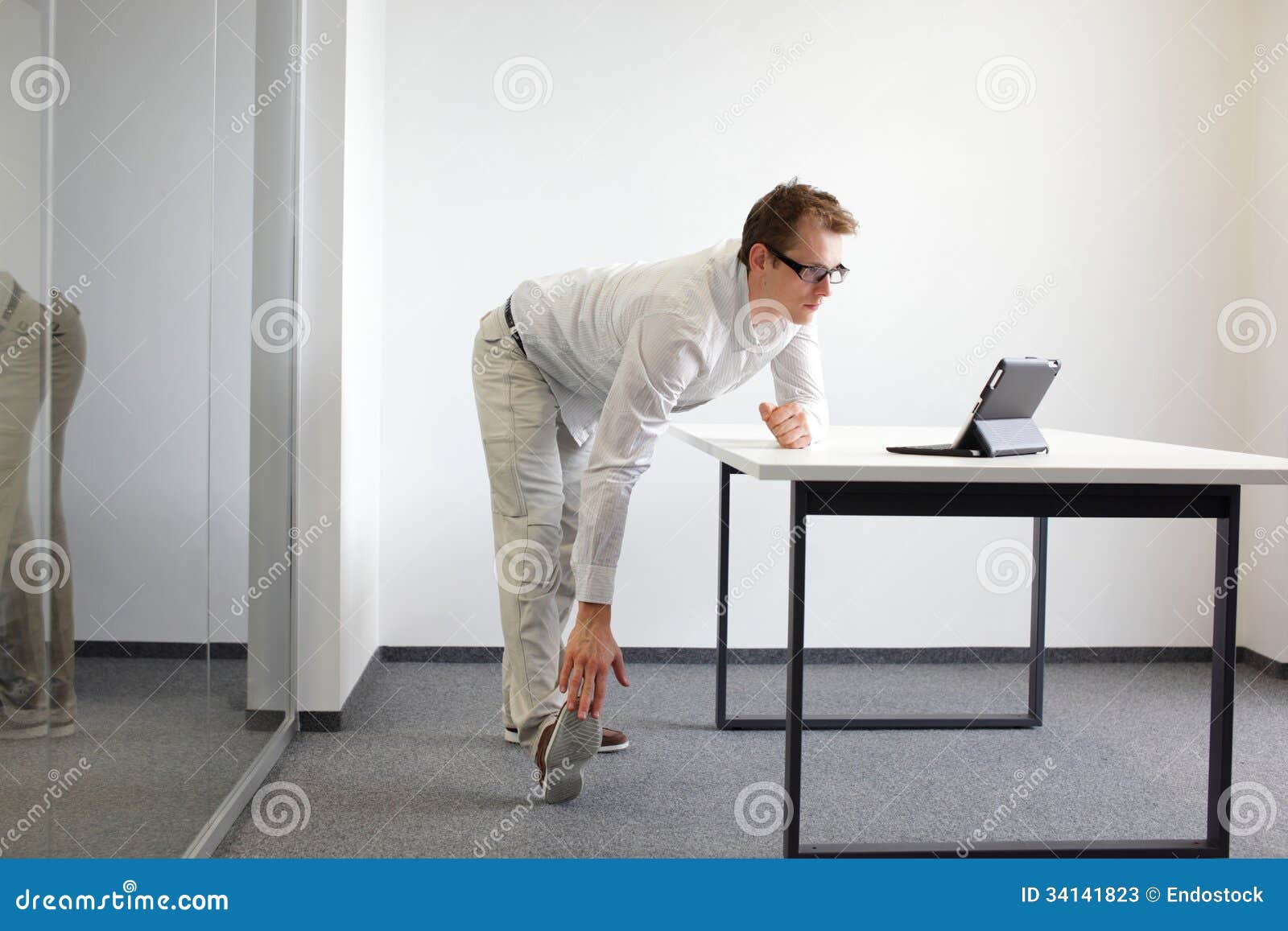 Leg - Arm Exercise during Office Work Stock Image - Image of focused ...