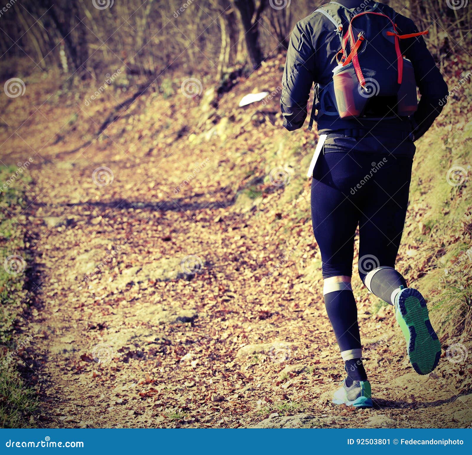Leg of Athlete Runner from Behind during Racing on the Mountain Stock ...