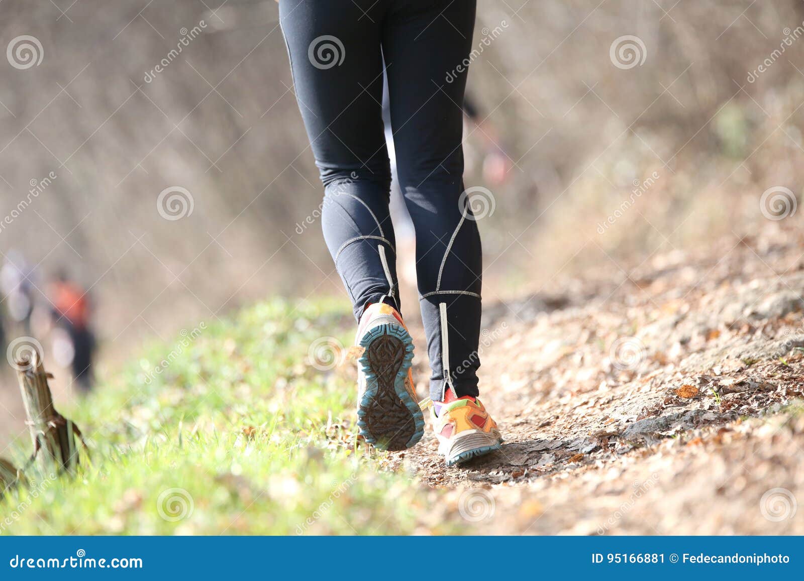 Leg of Athlete Runner from Behind during Racing on the Mountain Stock ...