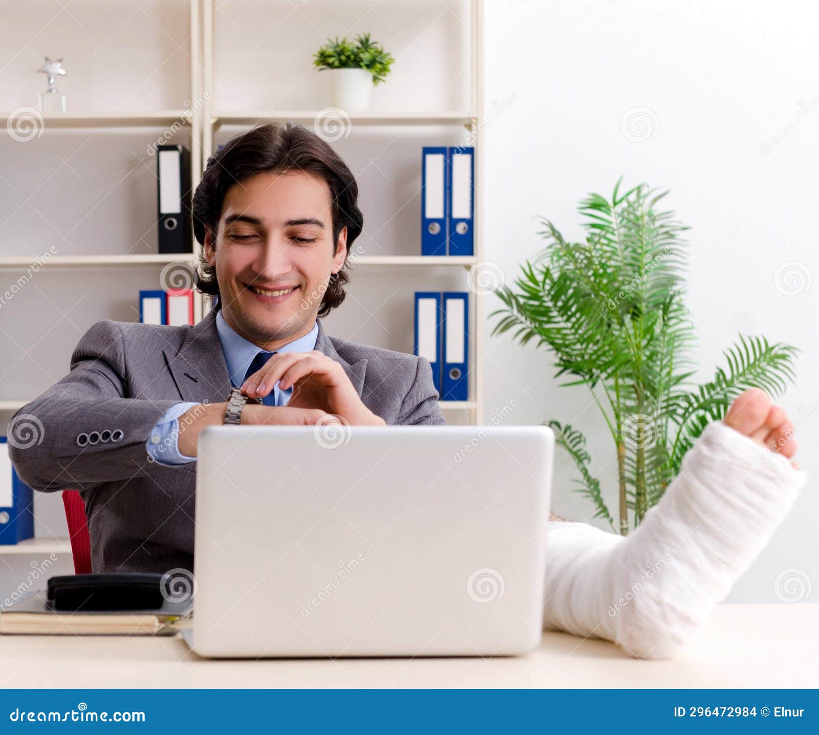 Leg Injured Employee Working in the Office Stock Photo - Image of foot ...