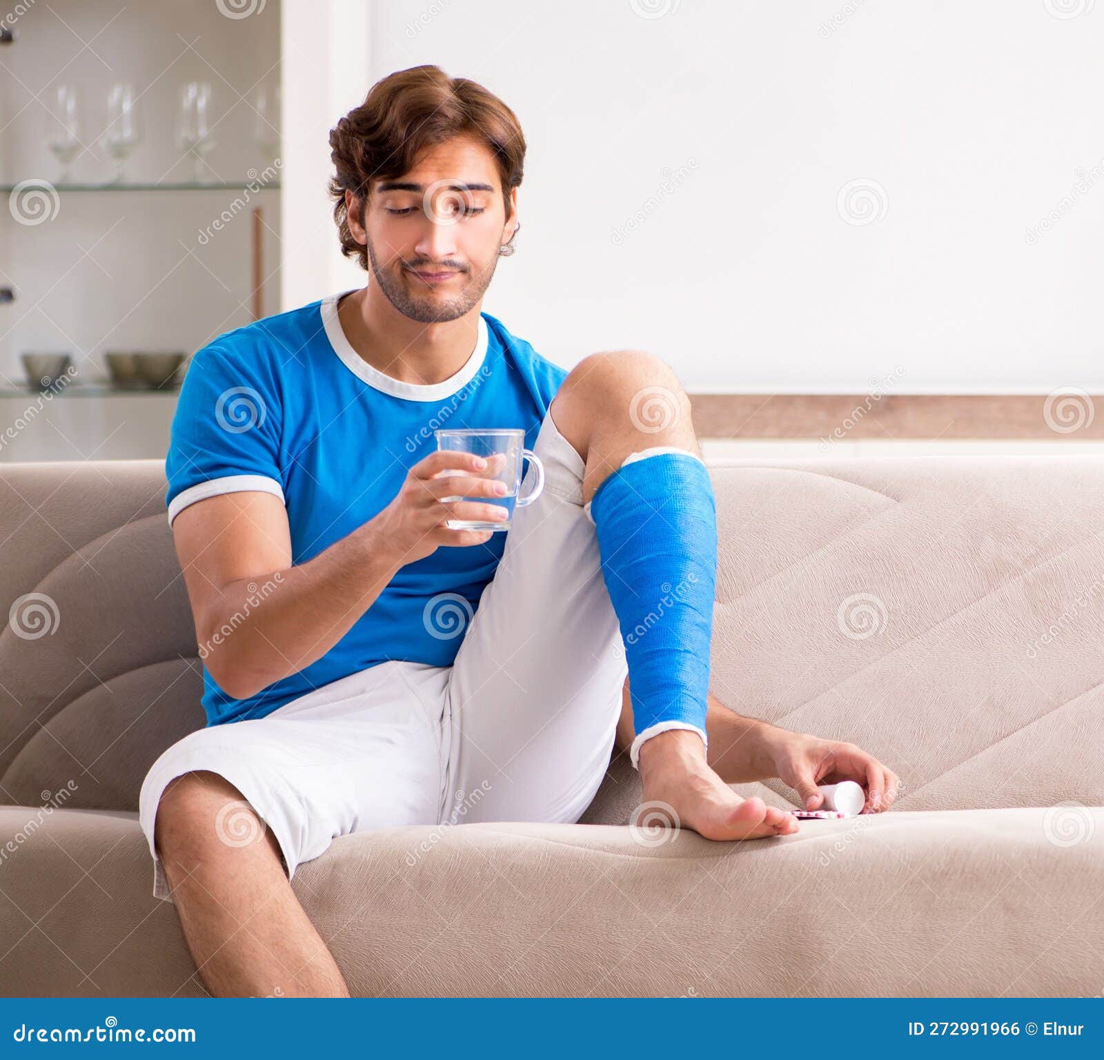 Leg Injured Young Man on the Sofa Stock Photo - Image of healthcare ...