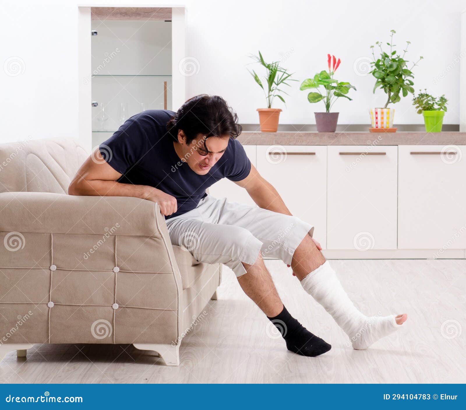 Leg Injured Young Man Suffering at Home Stock Image - Image of bandage ...