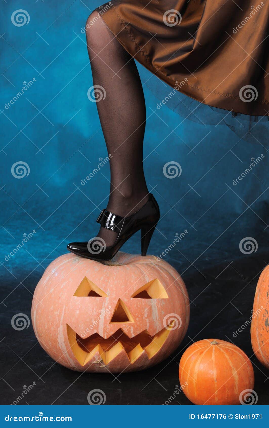 Leg on pumpkin stock photo. Image of holiday, mouth, adult - 16477176