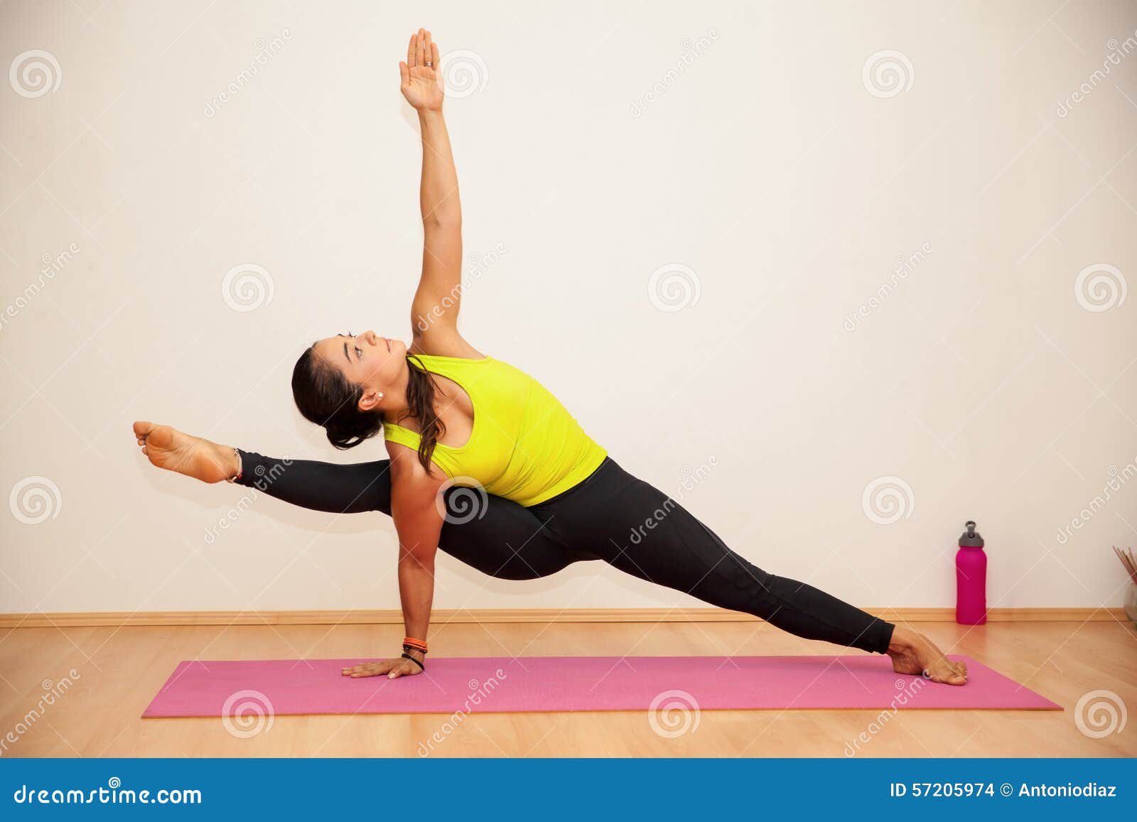 Leg split in a yoga studio stock photo. Image of sporty - 57205974
