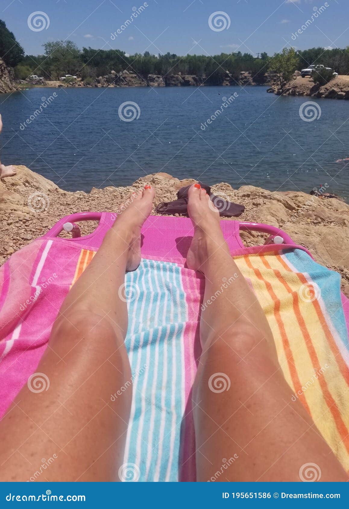Leg tanning day stock photo. Image of wave, footwear - 195651586