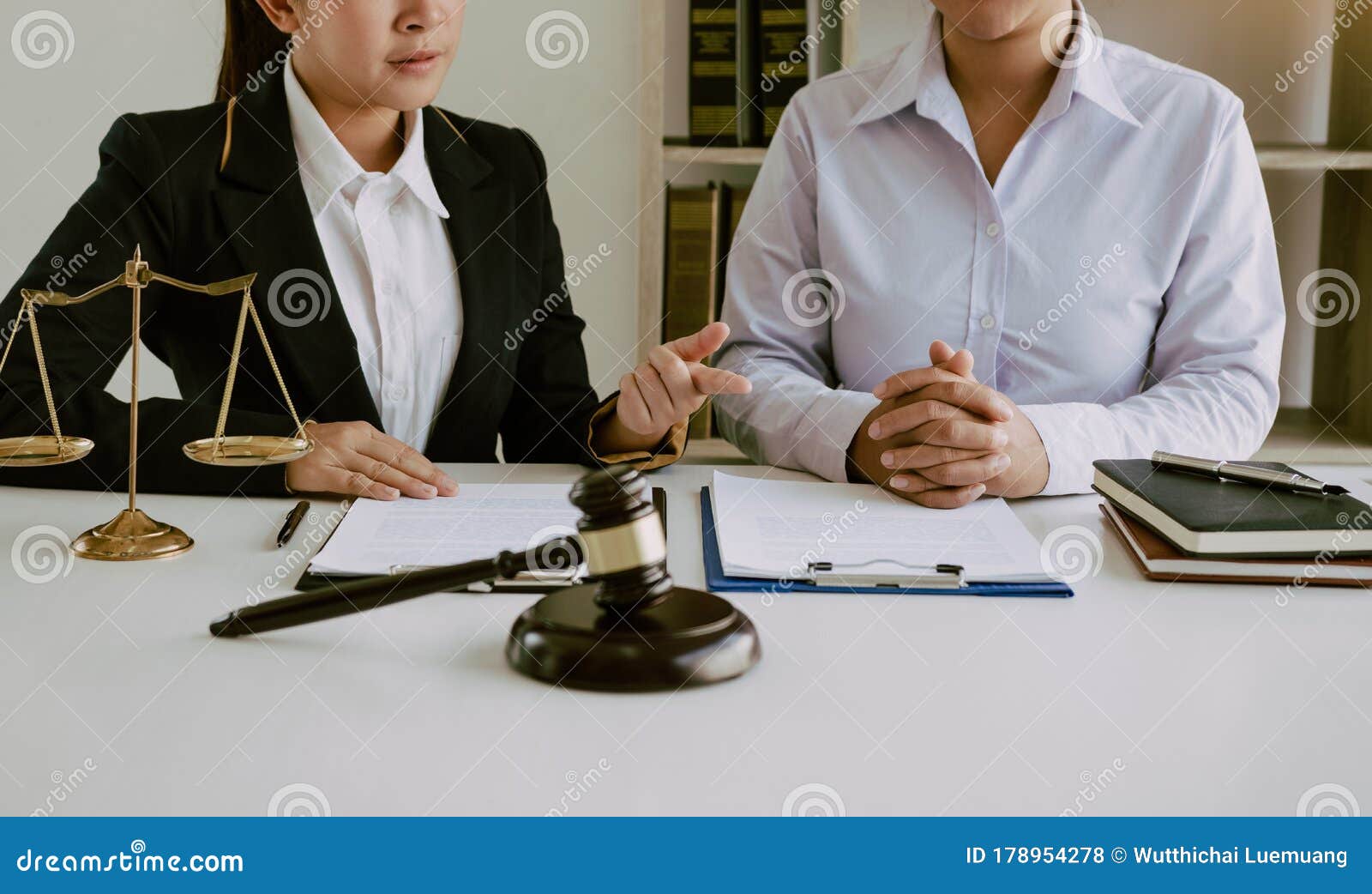 Legal Advisor is Explaining the Offense Under the Law in the Book at ...