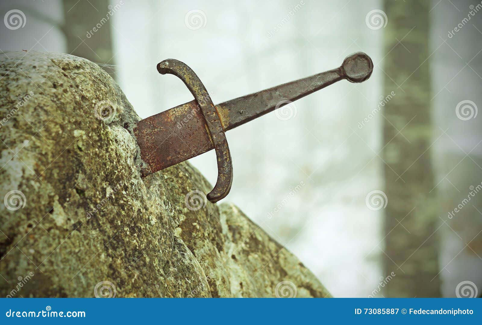 Legendary Excalibur Sword into the Stone in the Middle of the Forest ...