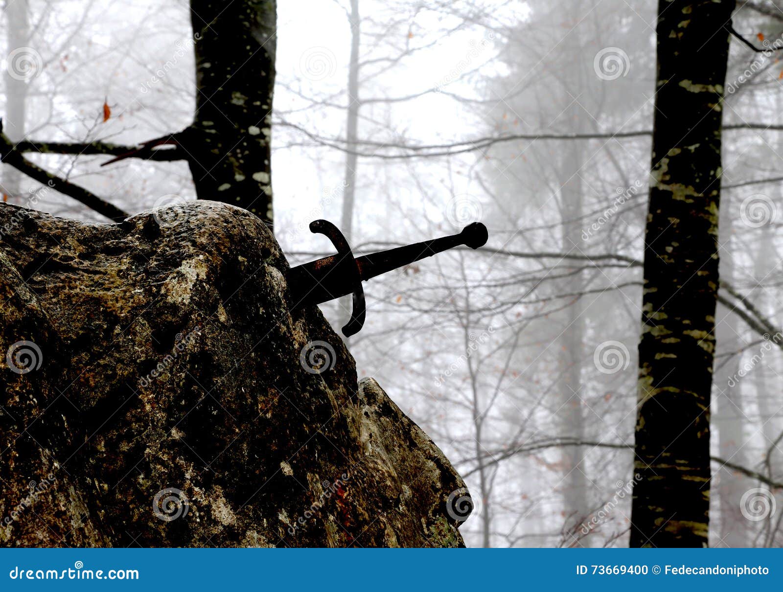 Legendary Excalibur Sword into the Stone in the Middle of the Fo Stock ...