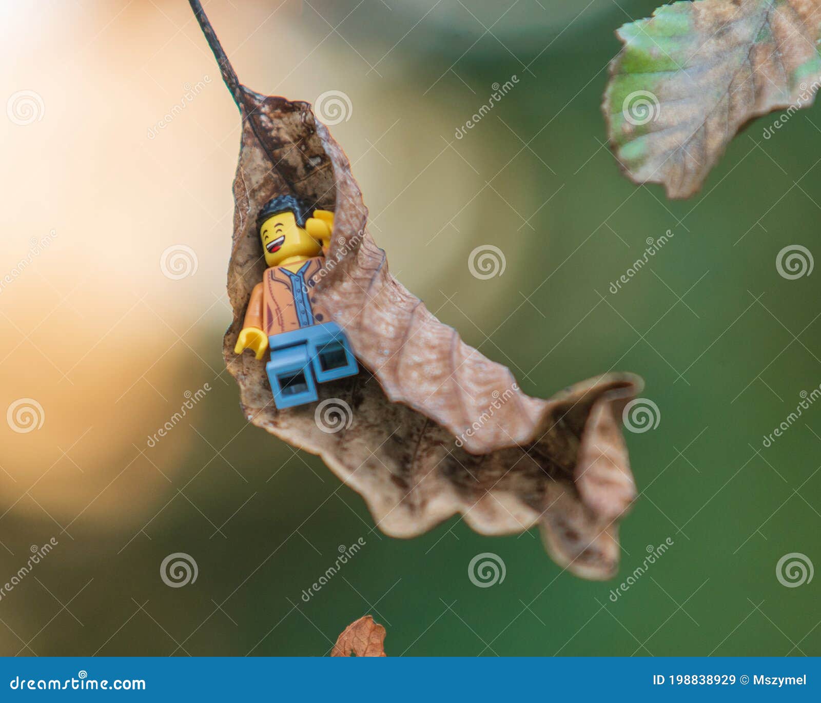 Lego Minifigure Sit on the Falling Leaf Editorial Stock Image - Image ...