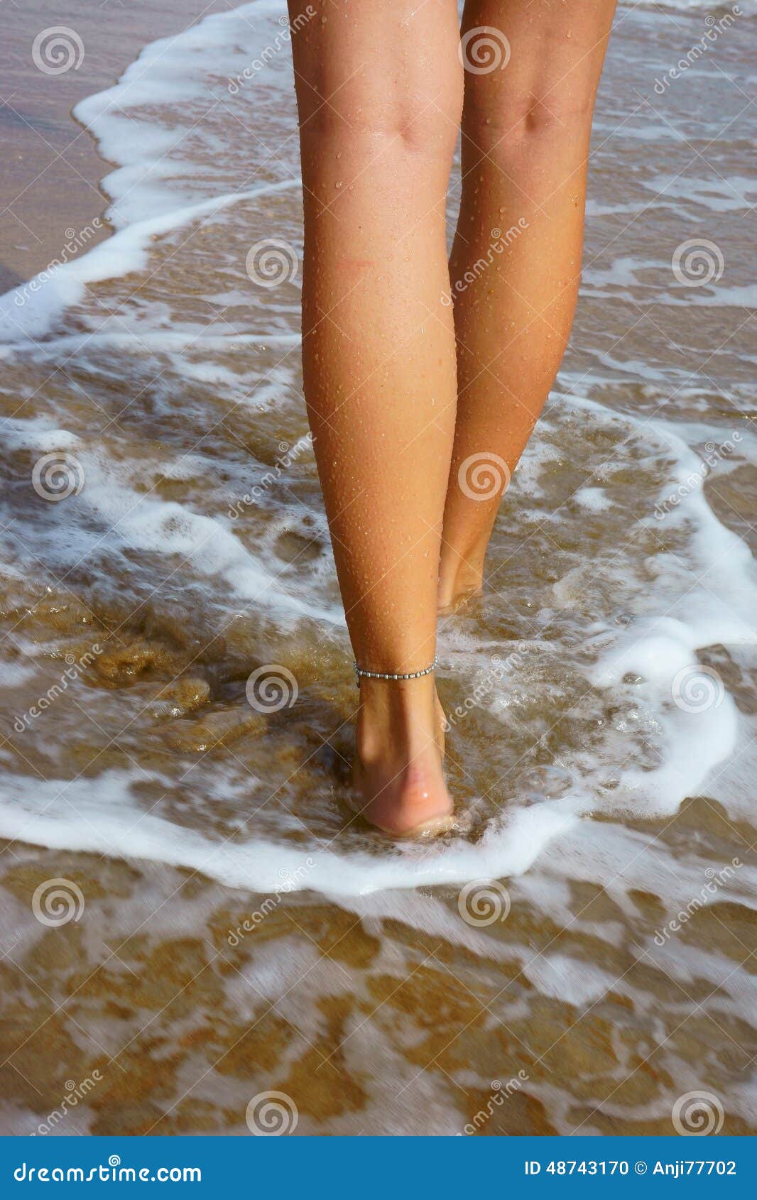 Legs are on the beach stock photo. Image of relaxation - 48743170