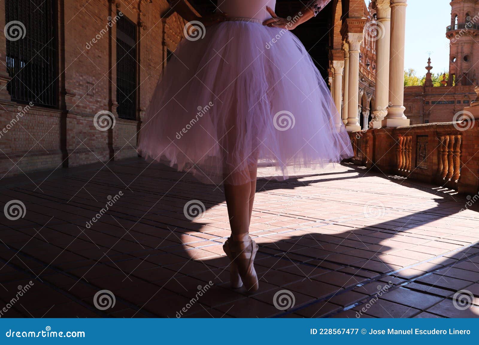 Legs of a Classical Ballet Dancer in Which she is Standing on Tiptoe ...