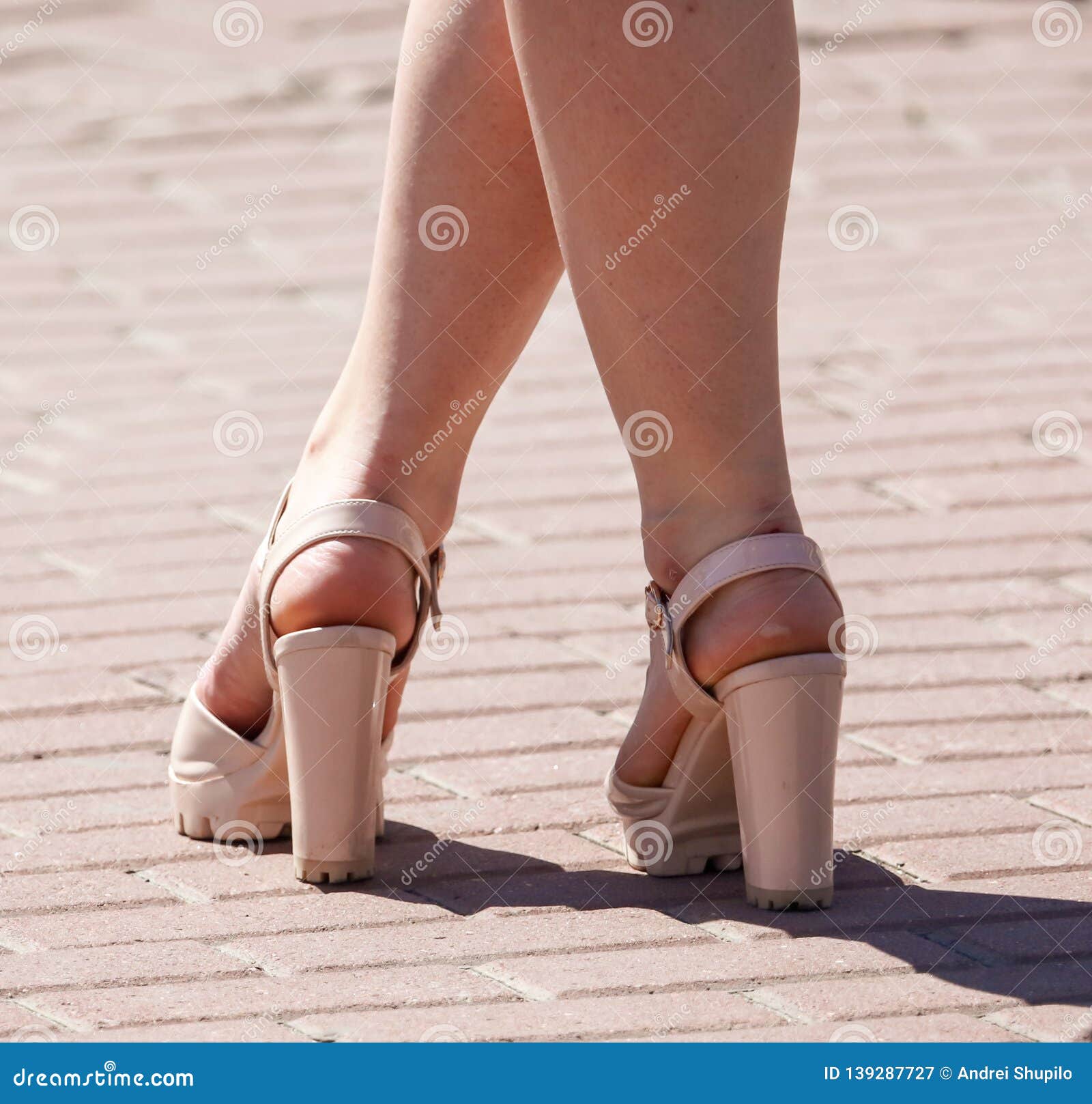 Legs of a Girl with Big Heels Stock Image - Image of woman, lady: 139287727