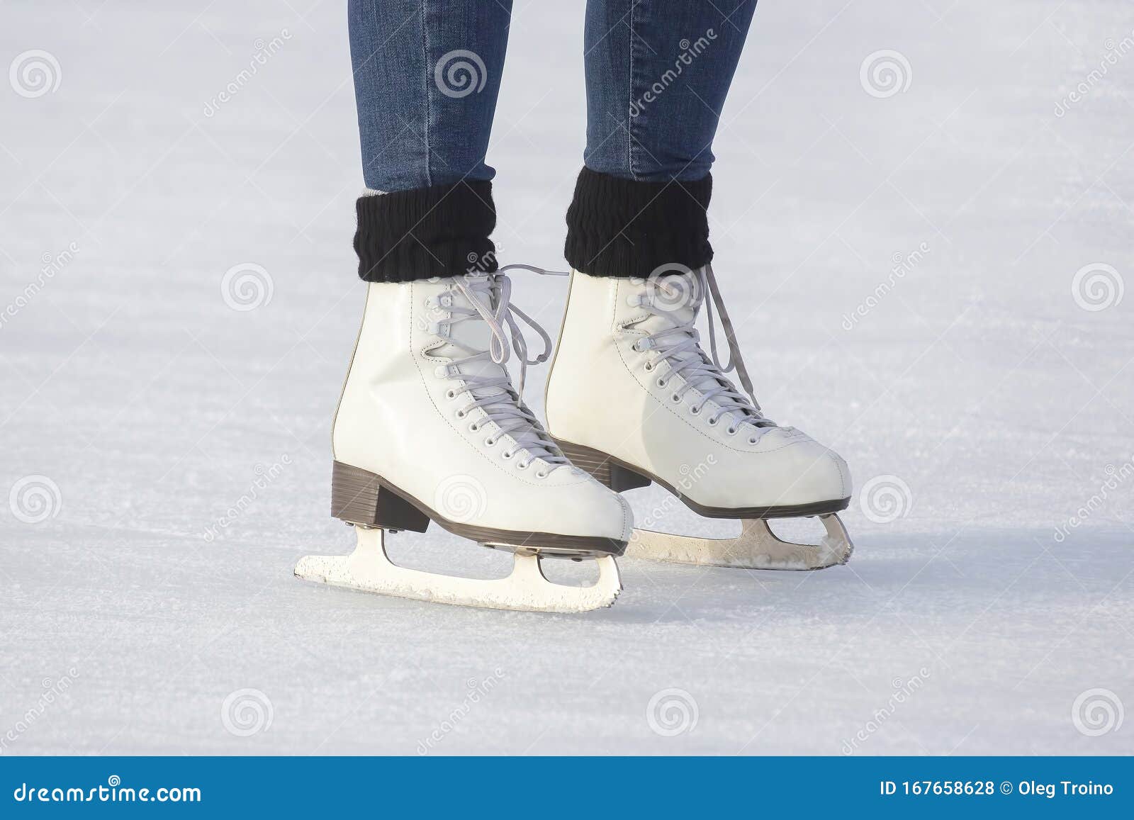 Legs of a Girl Ice Skating on an Ice Rink Stock Photo - Image of ...