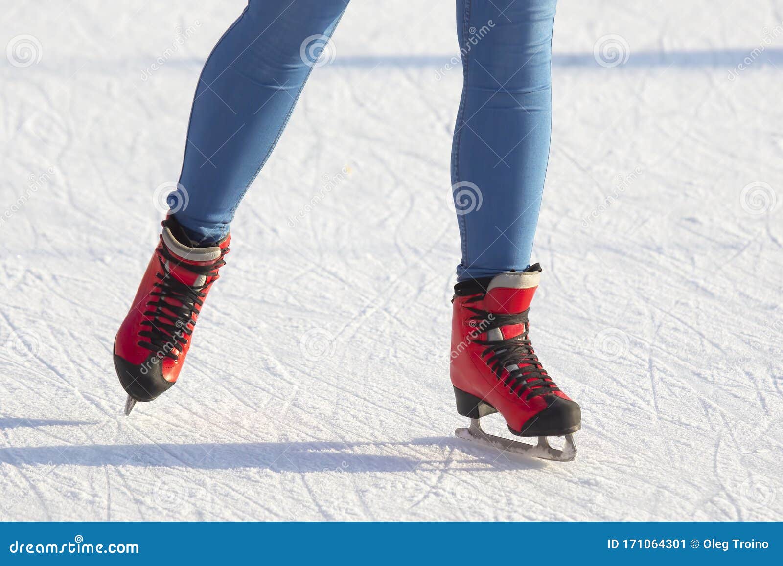 Legs of a Girl Ice Skating on an Ice Rink Stock Image - Image of ...