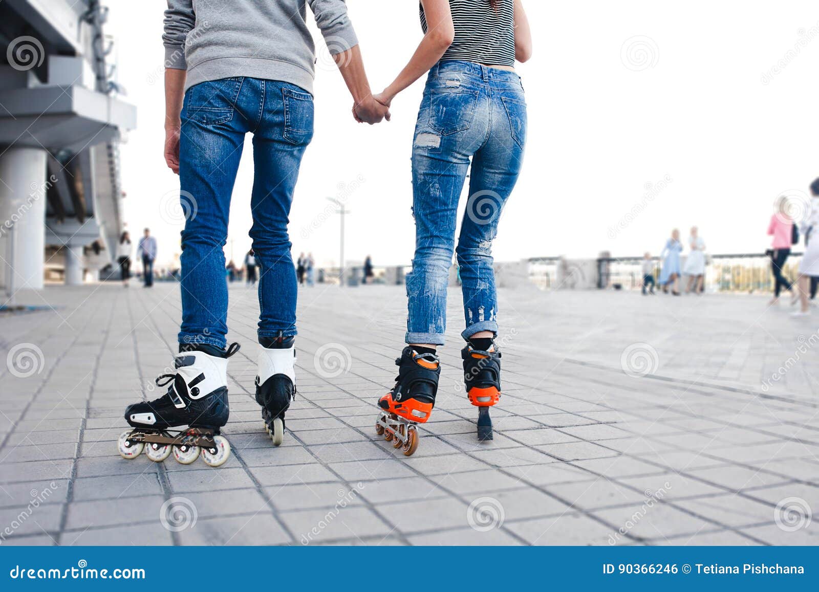 Legs Loving Couple in Jeans and Rollerblading. Ride on the Rolle Stock ...