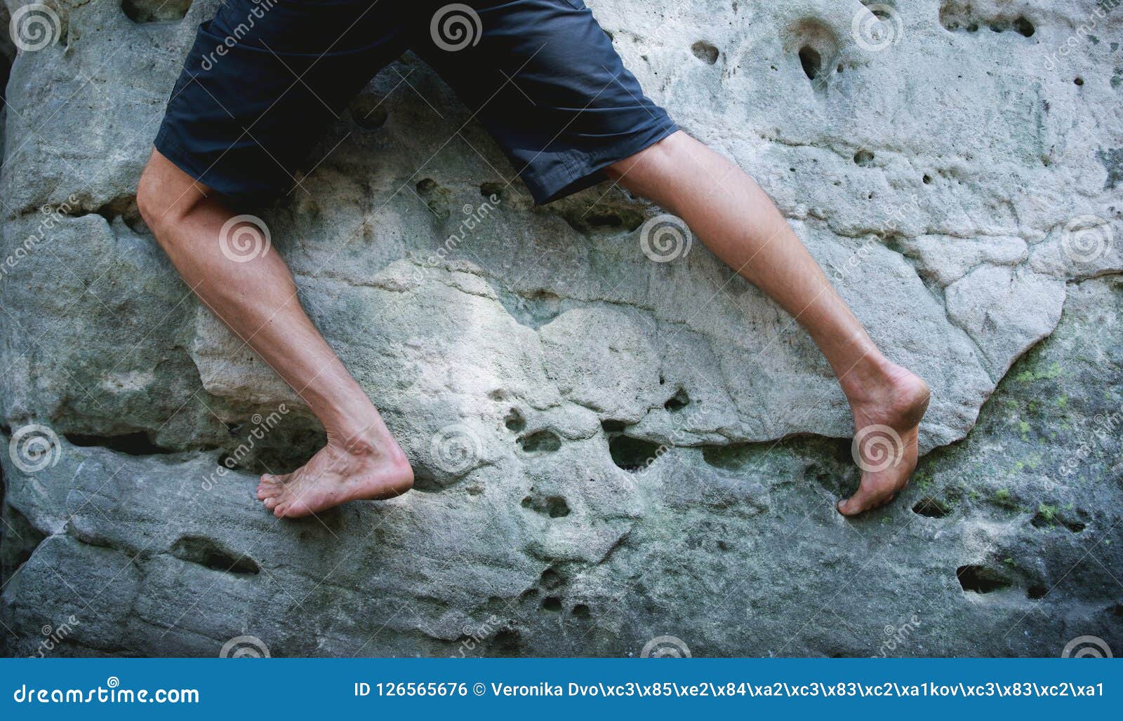Legs of Man Climbing on the Sandstone Rock. Stock Photo - Image of ...