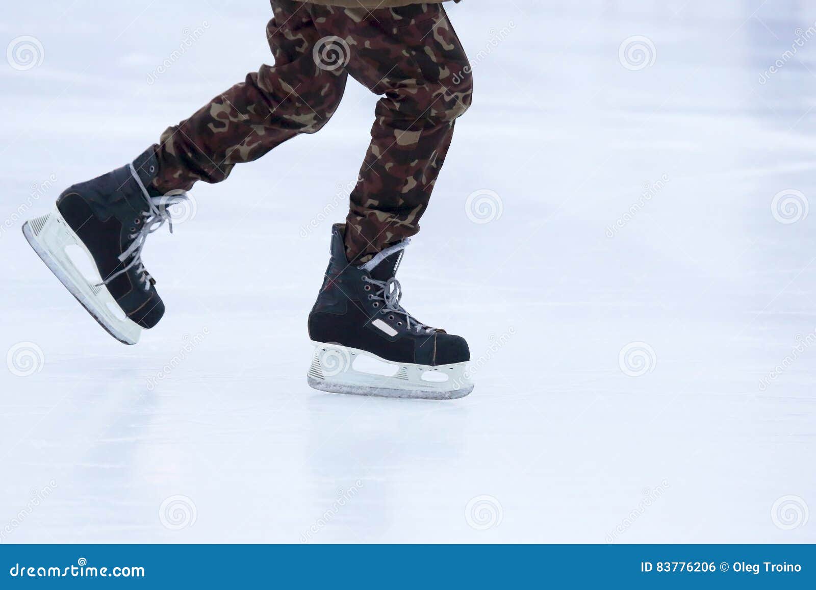 Legs of a Man Skating on an Ice Rink Stock Photo - Image of foot, legs ...