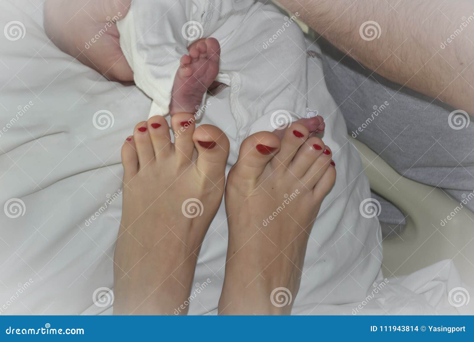 The Legs of a Mother and a Newborn Baby Stock Photo - Image of medical ...