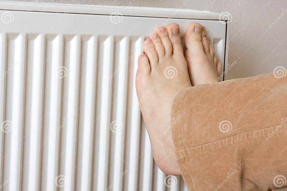 Legs on radiator stock photo. Image of steam, warmness - 8662252