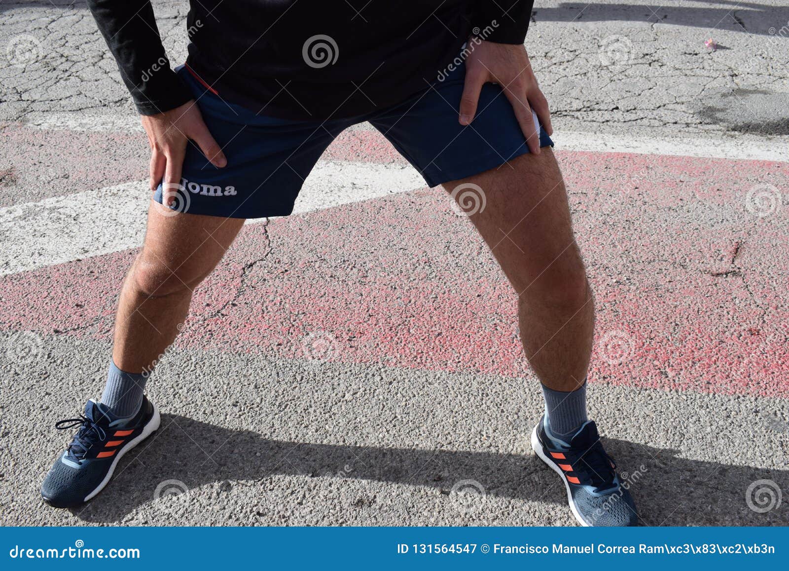 Legs of a Runner at the End of a Race Editorial Photography - Image of ...