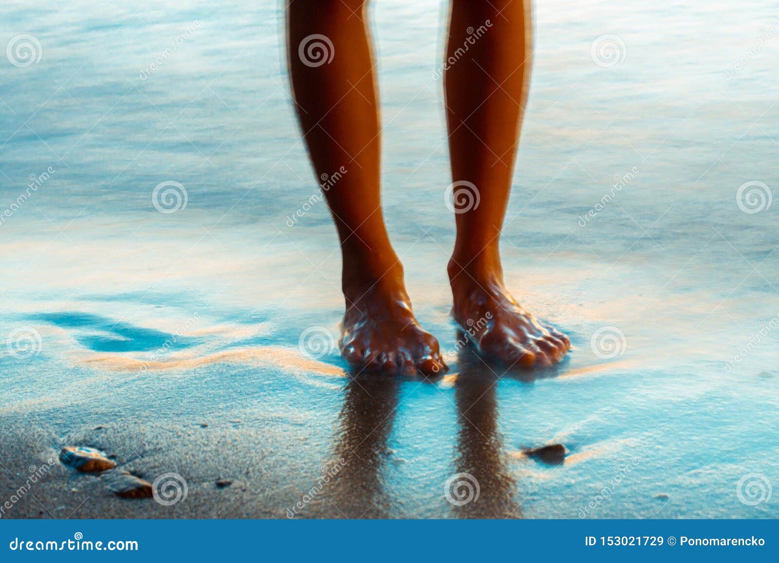 Legs at the Sea in the Evening Stock Image - Image of beach, feet ...