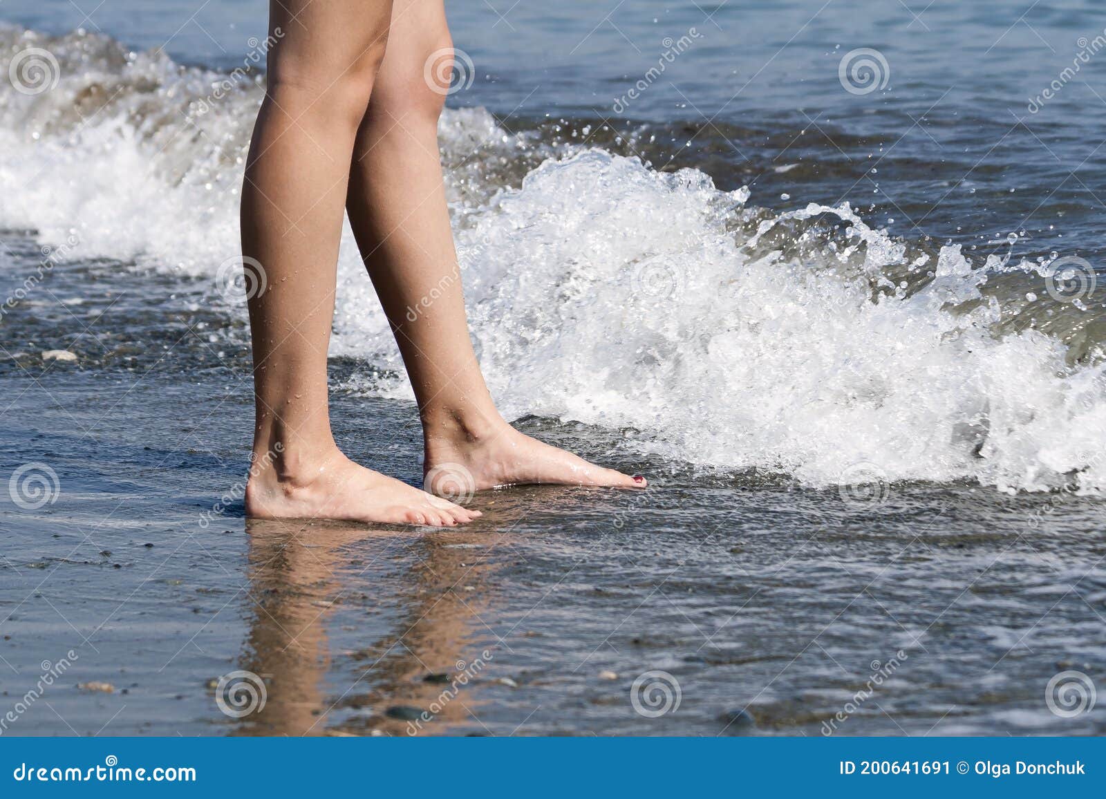 Legs beside sea waves stock image. Image of body, travel - 200641691